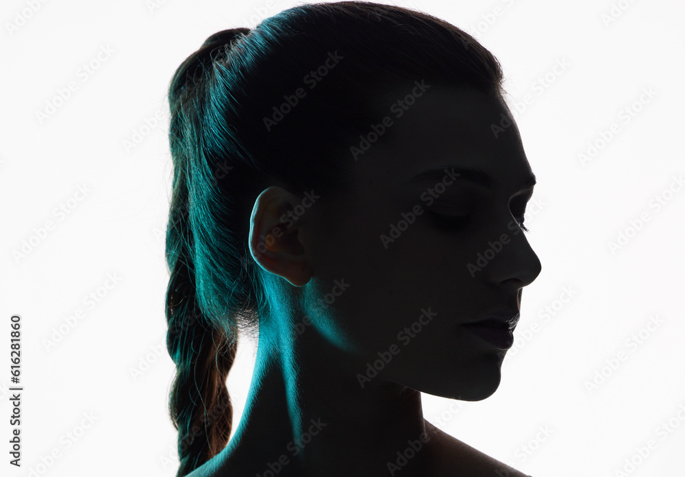 Woman face, beauty and silhouette with shadow in studio for creativity ...