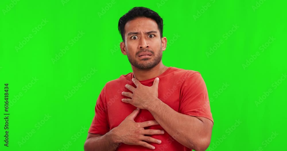 Shocked, scared and face of man on green screen for fear, horror and ...