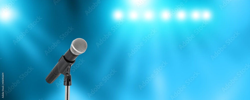 Microphone with stage light background for performance concept of ...