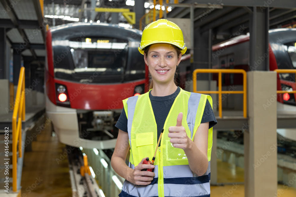 Posture giving the electric train signal to the train conductor in the ...