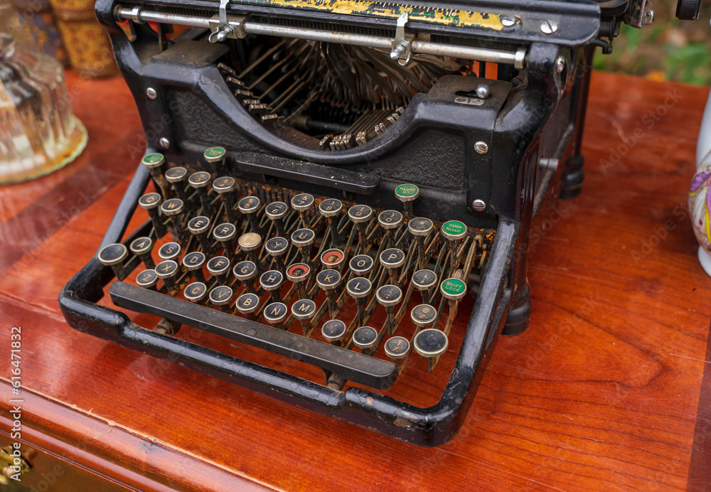 A vintage typewriter. Back in the 1900s, typing machines were popular ...