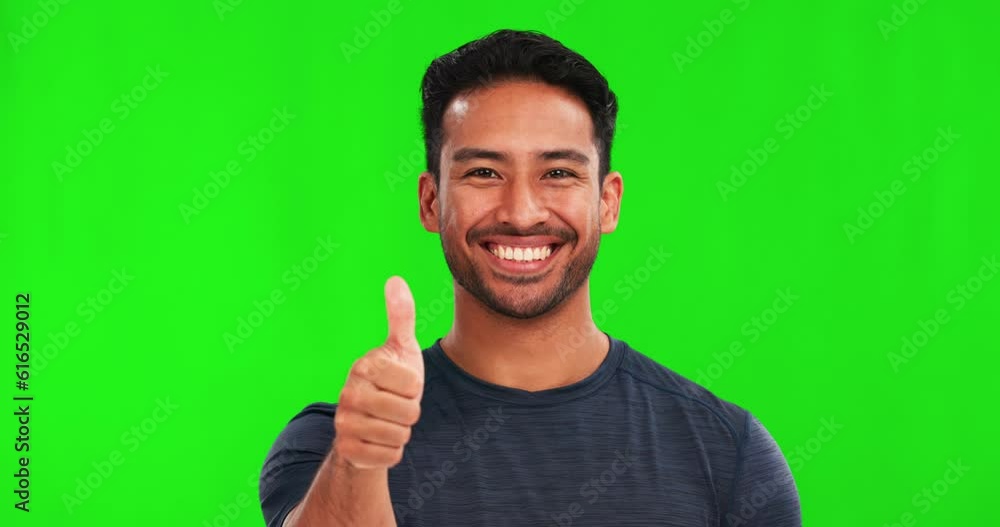 Thumbs up, face and happy man in green screen studio with hand, sign ...