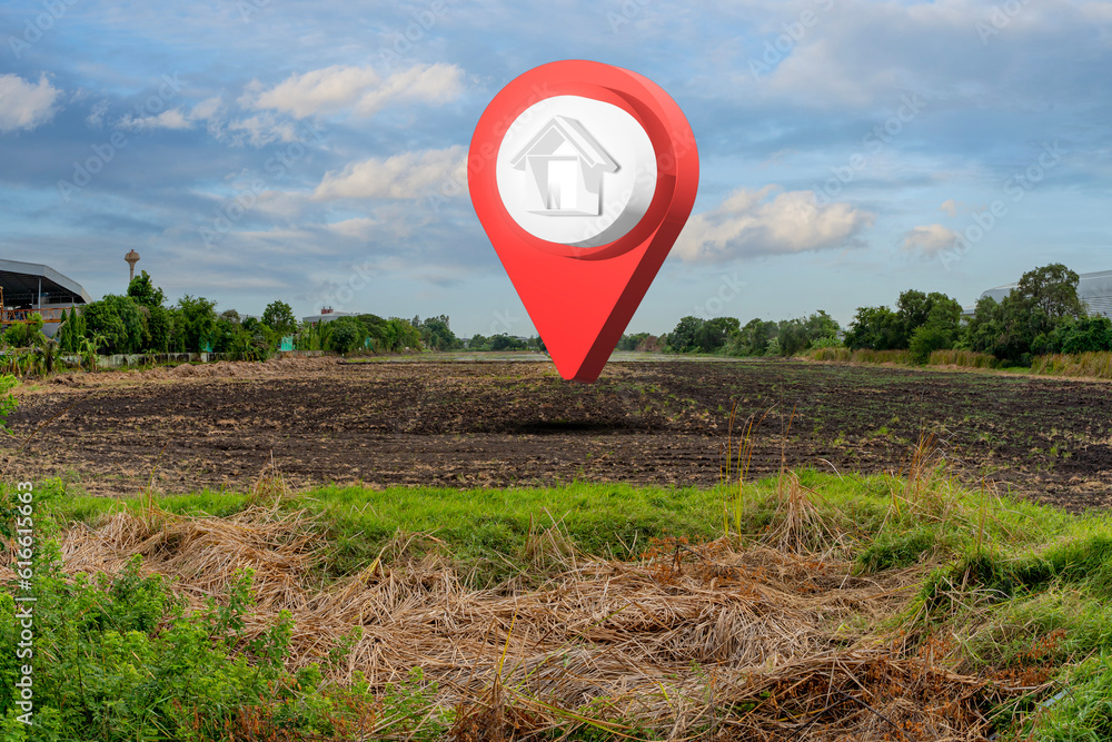 House symbol with location pin icon on empty dry cracked swamp ...