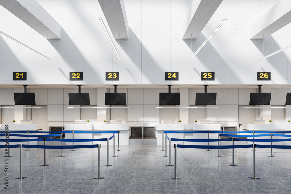 Airport interior with check-in zone and display with registration desk ...