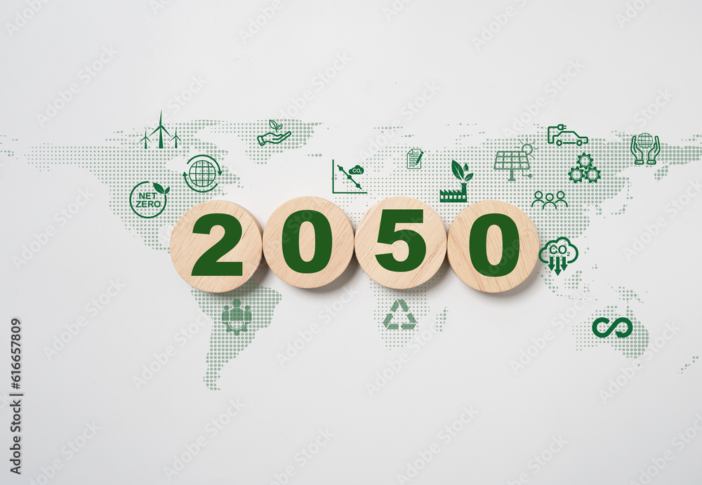 2050 year , CO2 reducing icon print screen on wooden and world map for ...