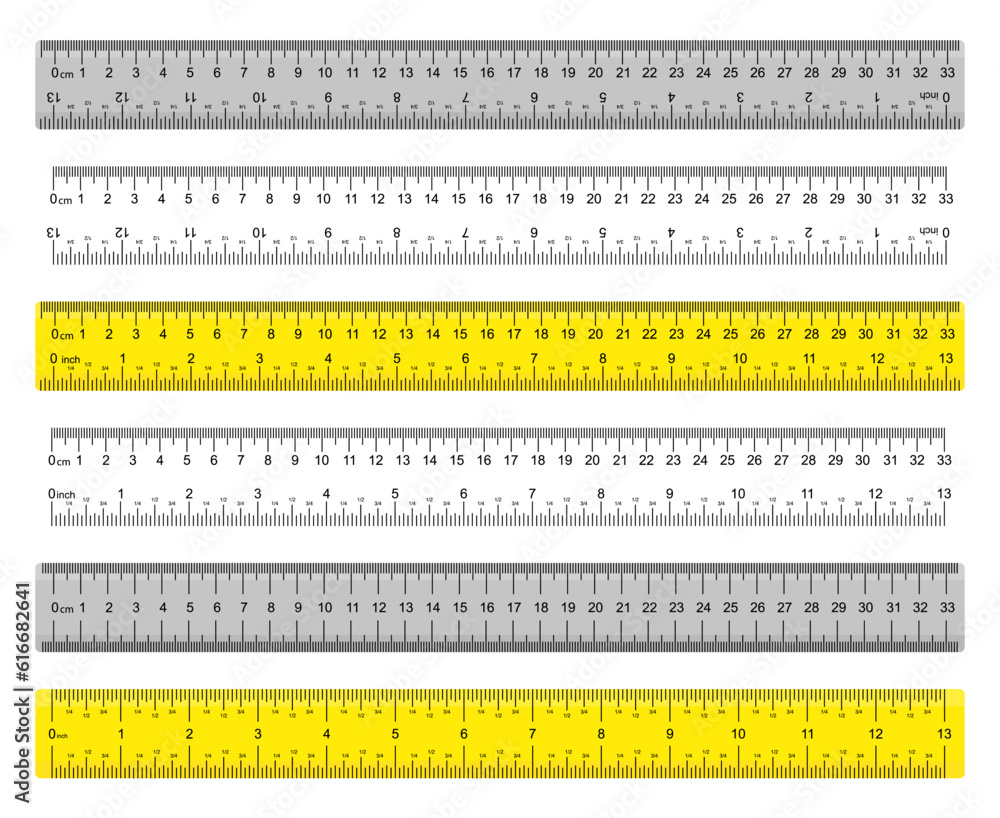 A yellow ruler marked with centimeters, inches and combined rectangular ...
