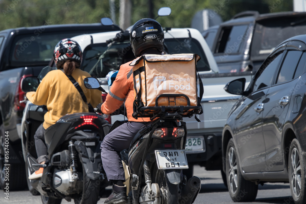 Delivery service man ride a Motercycle of Shopee Food Stock Photo ...