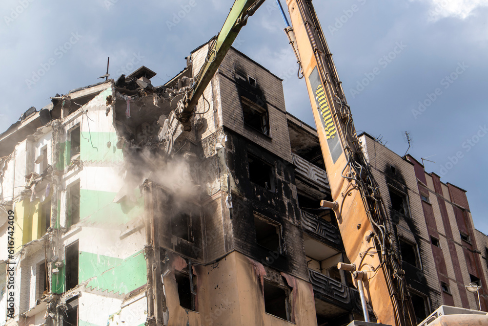 Demolition of a high-rise building. The collapse of a residential ...