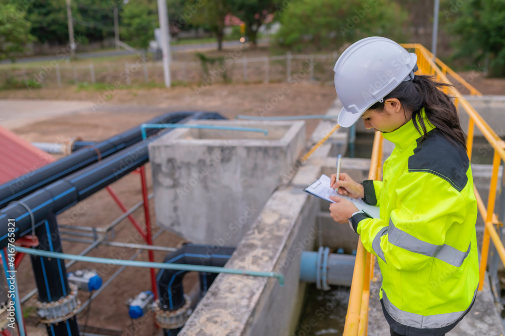 Environmental engineers work at wastewater treatment plants,Water ...