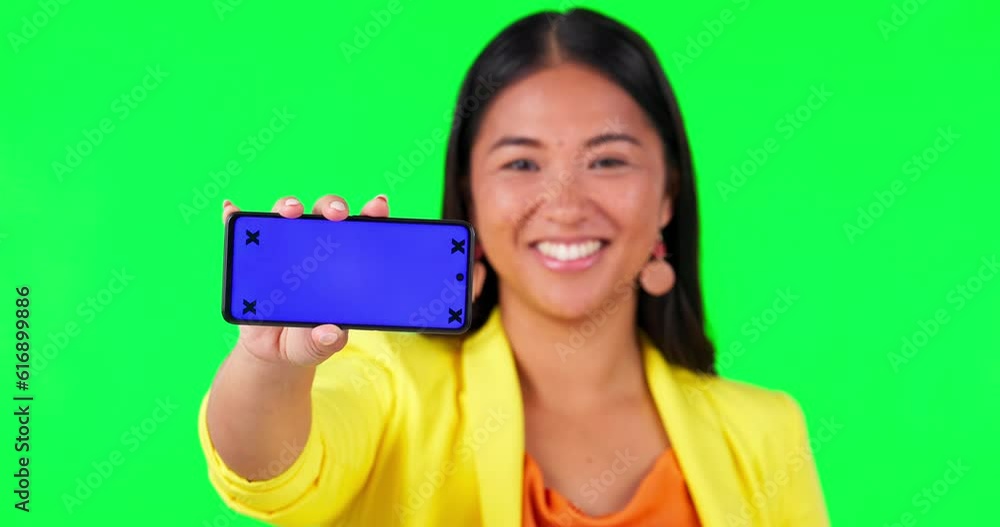 Woman face, green screen and hand pointing to phone mockup with ...