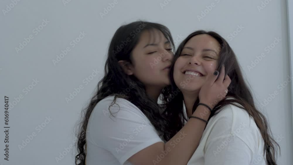 female friends laugh hug kiss, friendship great connection, two adult ...