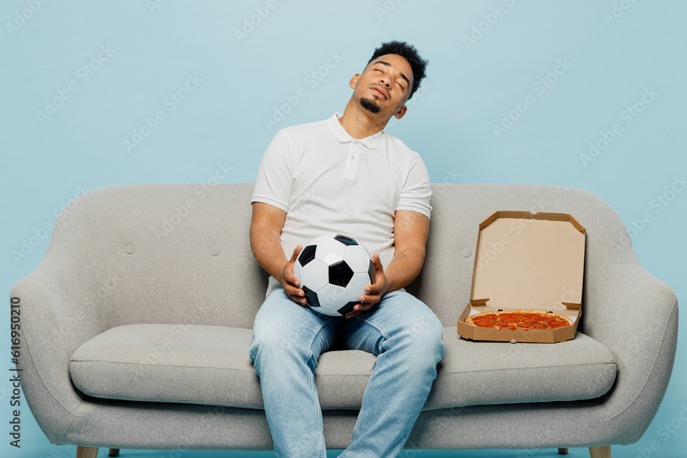 Full body dissatisfied exhausted sad young man fan in t-shirt cheer up ...