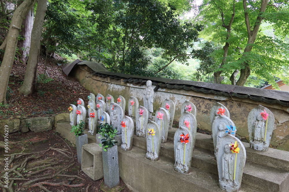 The scene of stone statues of Jizo in the precincts of Bishamon-do ...