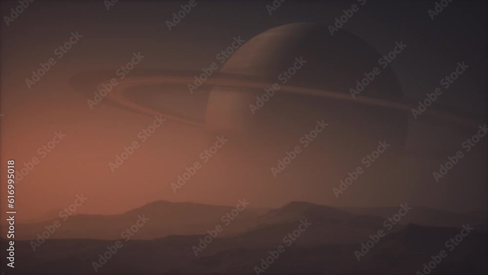 The unhospitable surface of Titan with Saturn in the distance Stock ...