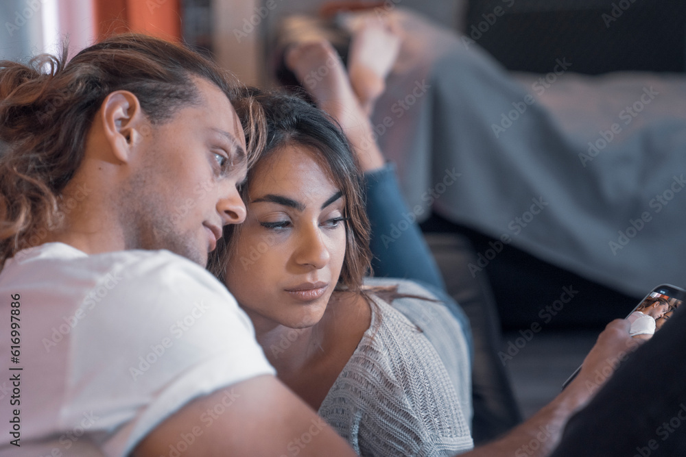 Cheerful couple of romantic serious caucasian guys sharing a night ...