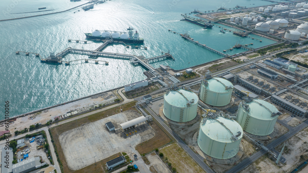 LNG (Liquified Natural Gas) tanker anchored in Gas terminal gas tanks ...