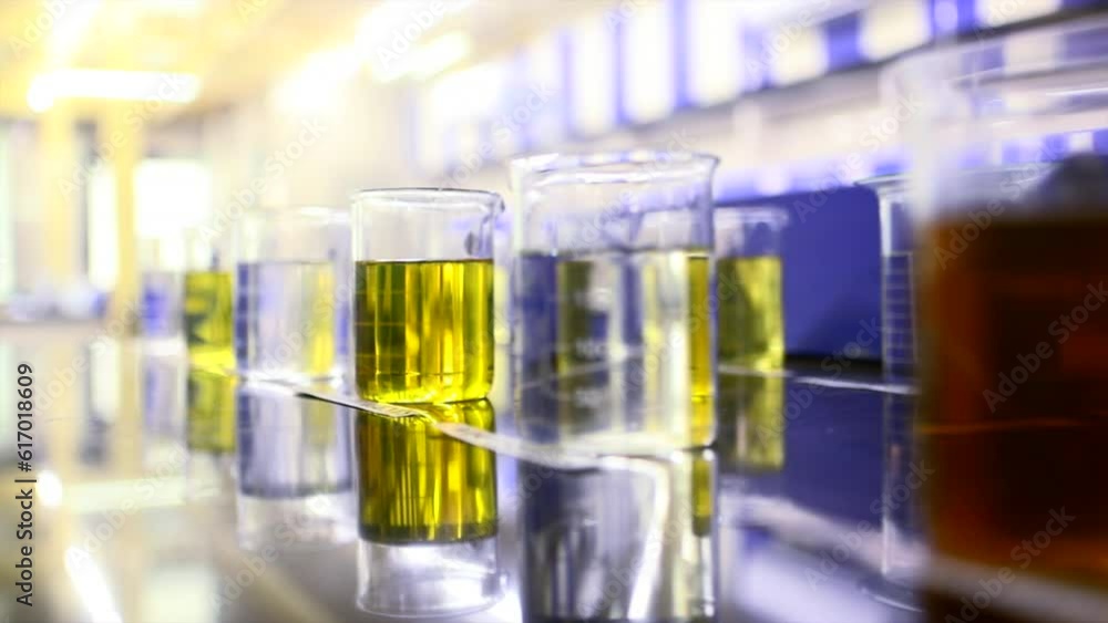 Multiple Beakers in lab and multi colour liquid or chemical in borosil ...