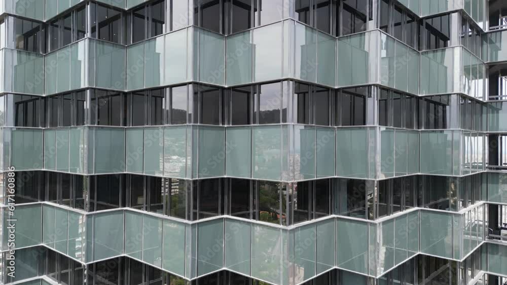Bottom view of office building window close up, reflection and ...