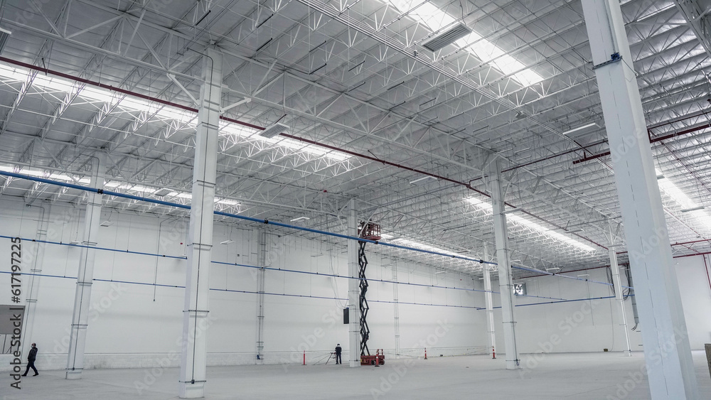 Concrete floor inside industrial building. Use as large factory ...