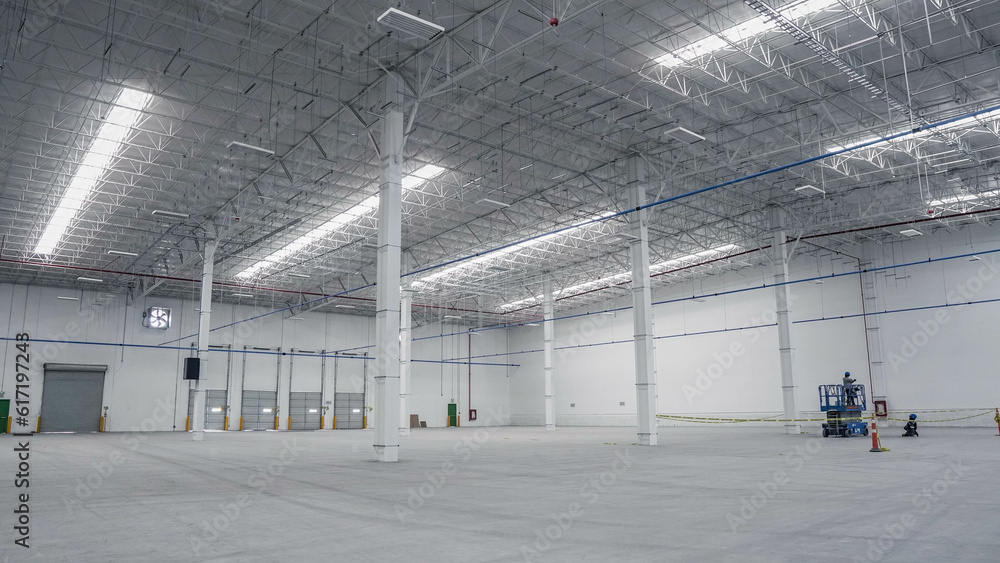 Concrete floor inside industrial building. Use as large factory ...