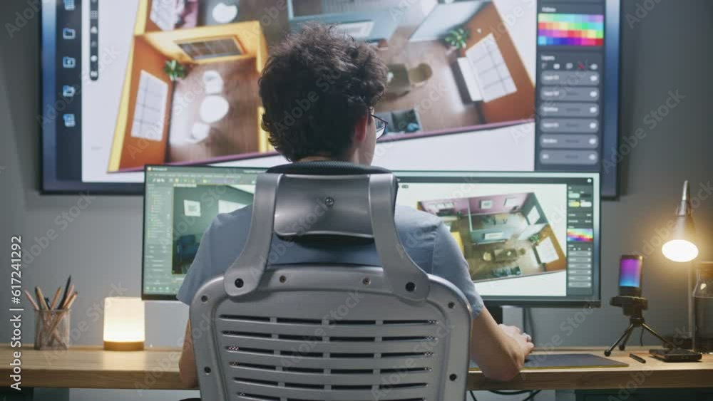 Back view of 3D designer creating modern house interior design, working ...