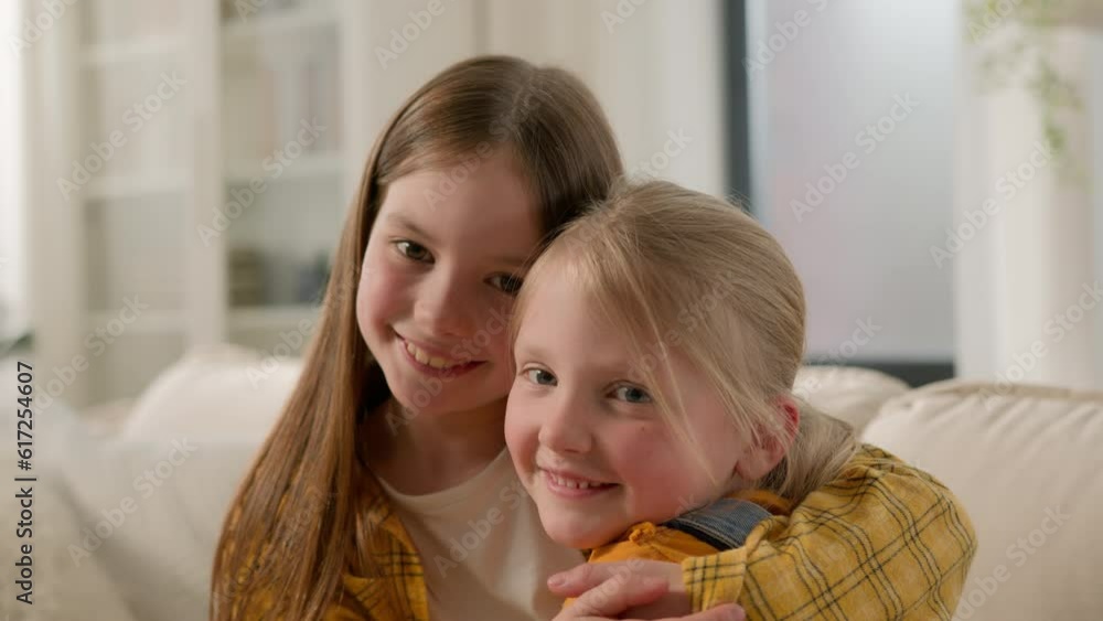 Two happy cute smiling loving caucasian kids little girls children ...