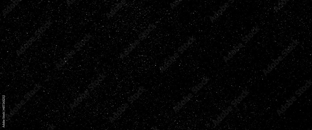 Flying dust particles on a black background, black glitter texture ...