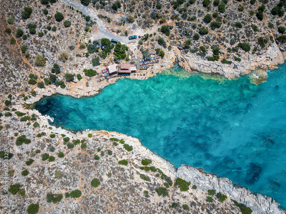 Aerial top view of the beautiful bay at the Limanakia area, Vouliagmeni ...