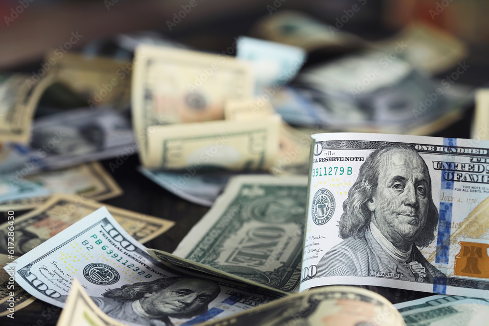 Money, US dollar bills background. Money scattered on the desk ...