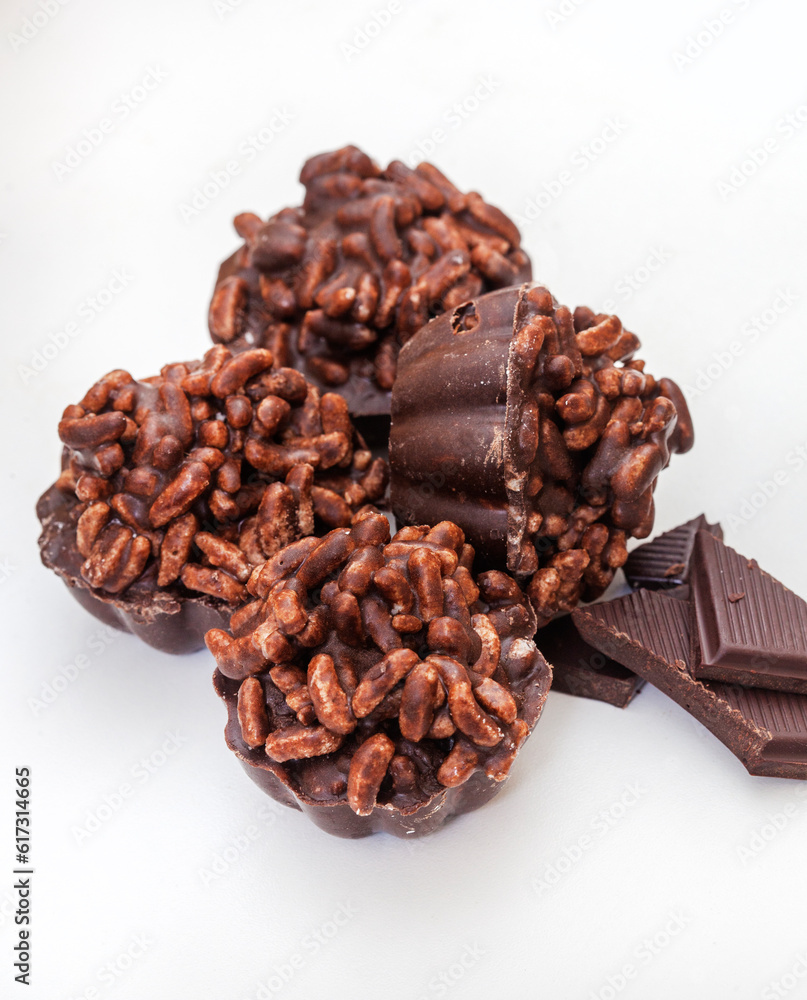 Puffed rice and chocolate cups. Milk chocolate crispy rice treats on ...