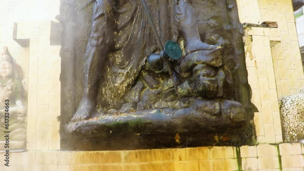 ancient shiva statue with natural holy hot spring water at day from ...