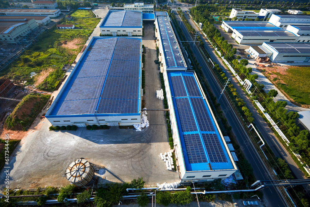 Aerial photography of solar photovoltaic panels built on the roof of a ...
