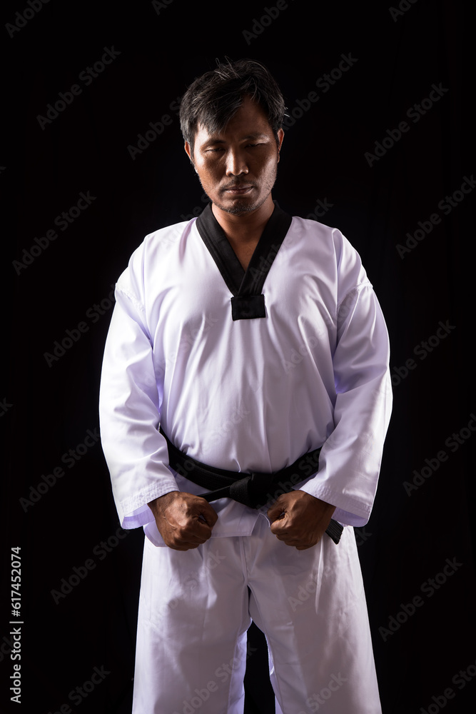 Black Belt TaeKwonDo Asian male athlete man show traditional Fighting ...