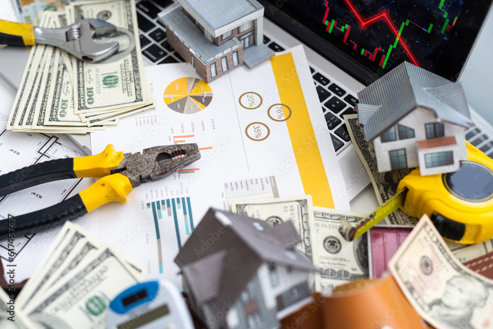 Working on construction project background. Office table with dollars ...
