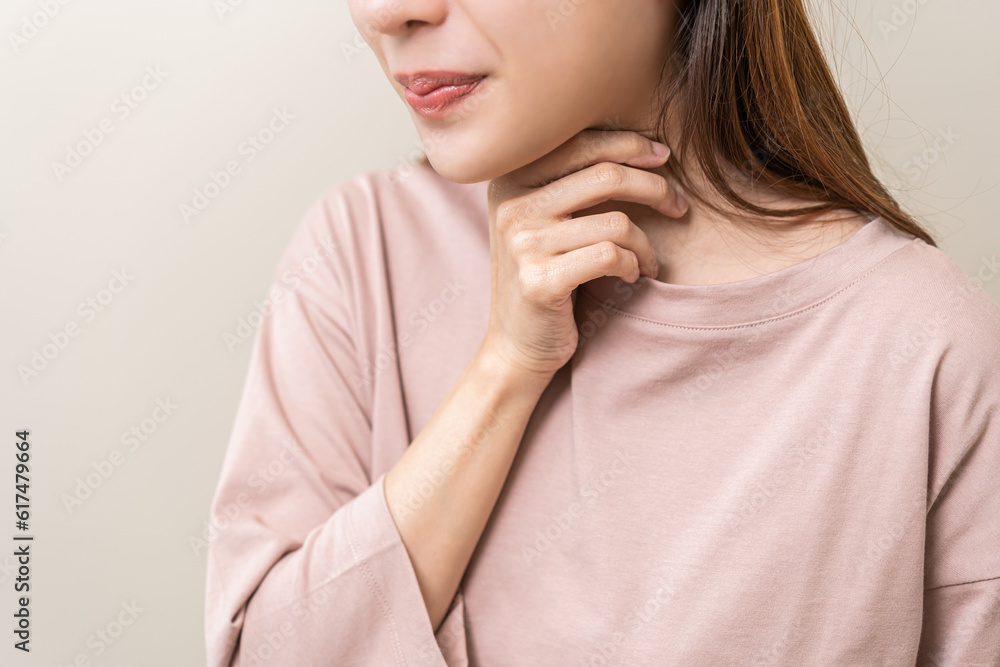 Sickness in inflaming asian young woman, girl use hand check self touch ...