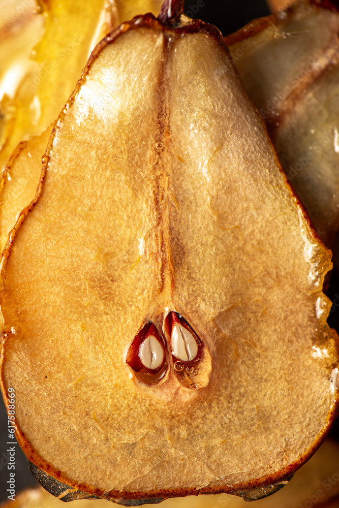 Candied pear chips, first dehydrated and then dipped in a caramel sugar ...