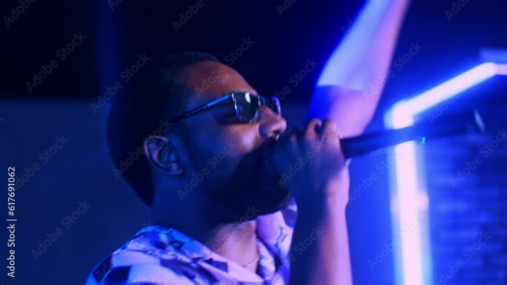 Black african male man artist singer rapper showman performs on the ...