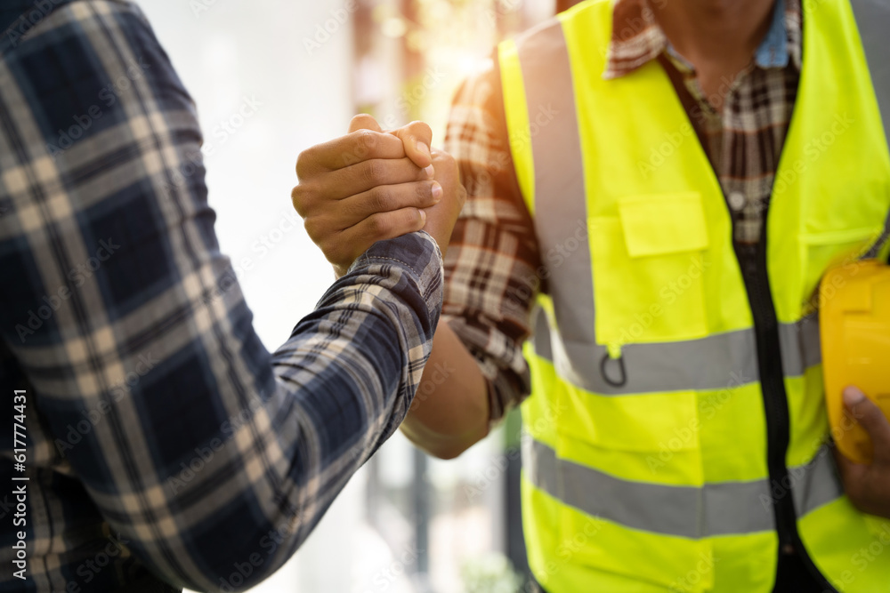 Team architects workers hands to join forces to join forces to work for ...