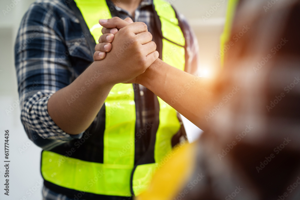 Team architects workers hands to join forces to join forces to work for ...