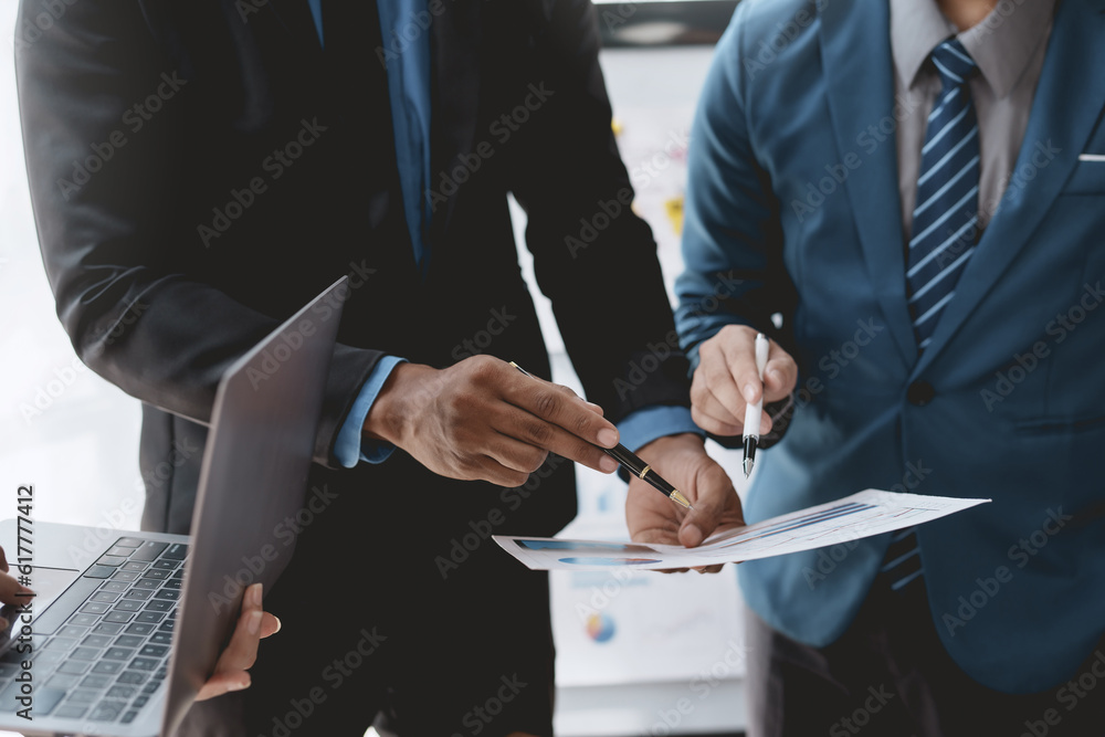 Successful Business Team Meeting Pointing at Graph for Strategic ...