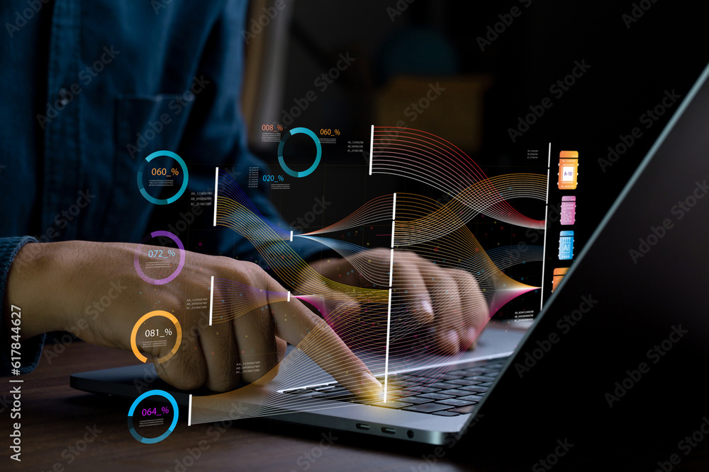 Analysts use computers to analyze and visualize complex data on a ...