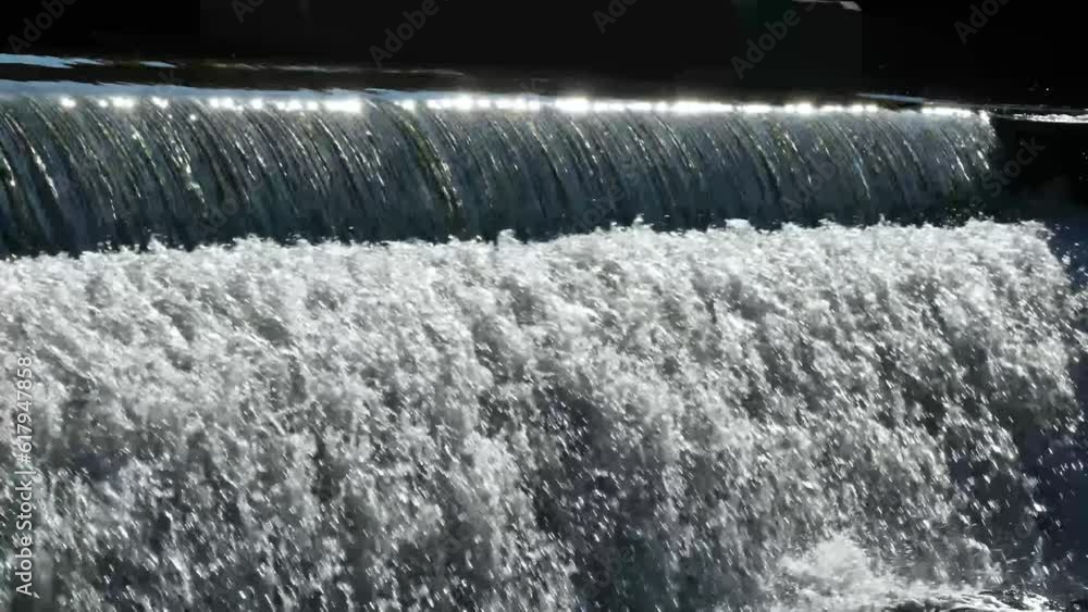 Beautiful flowing water over a cascading bridge forming stunning ...