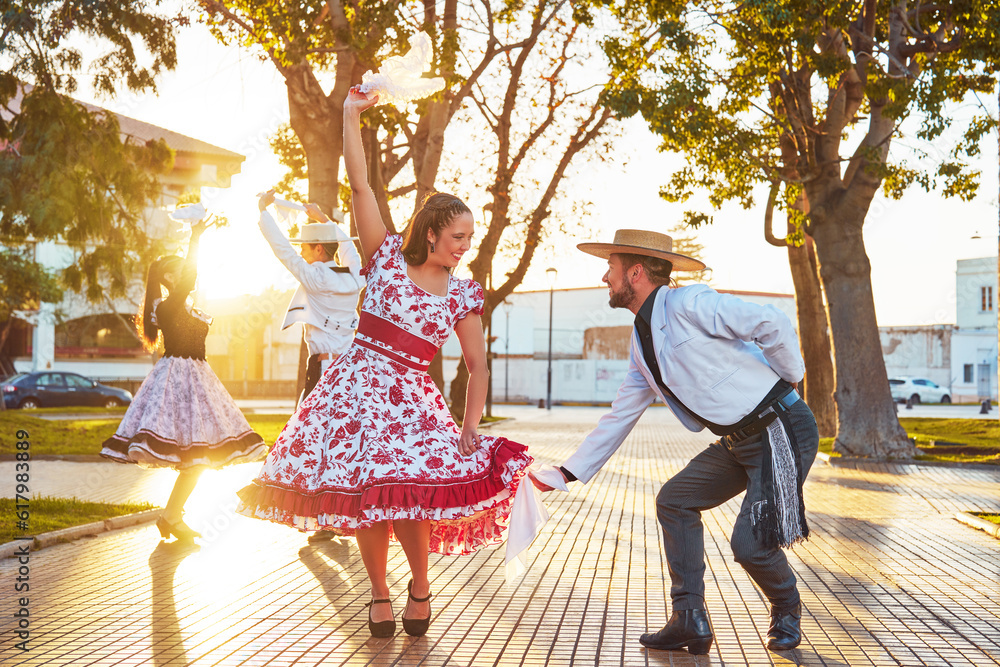 group of Latin American young adults wearing huaso costume dancing ...