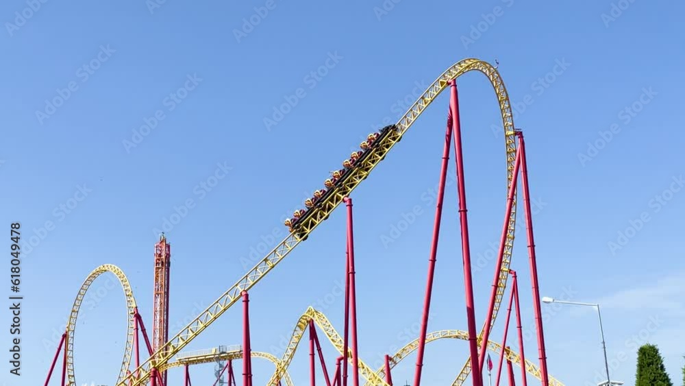 Amusement trolley cart makes uphill downhill and sharp turns upside ...