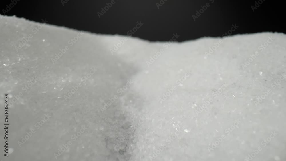 Vidéo Stock Macro video showcasing white sugar using a probe lens ...