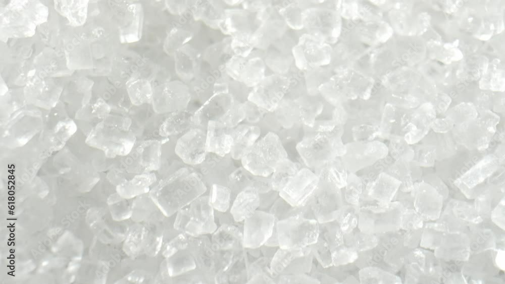 Vidéo Stock Macro video showcases the details of white sugar crystals ...