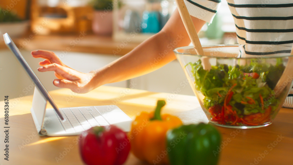 Beautiful young Asian woman hand finger slide tablet screen following ...