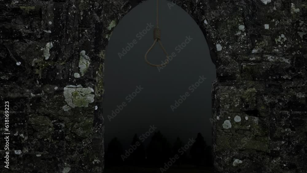 A rope with a hangman's noose swinging in the breeze from the arch of ...