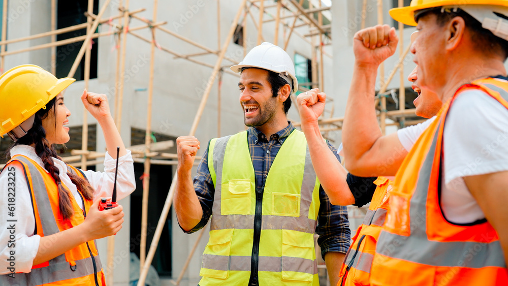 Civil engineers team with safety hard hat working together at ...