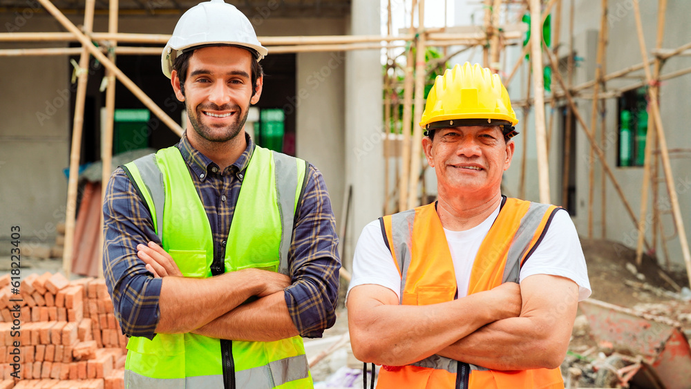 Civil engineers team with safety hard hat working together at ...